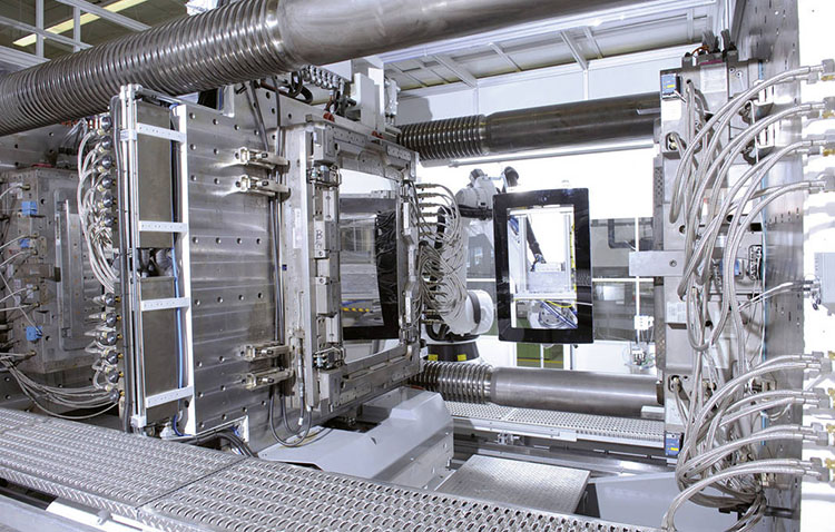 Plastics injection moulding system by Engel